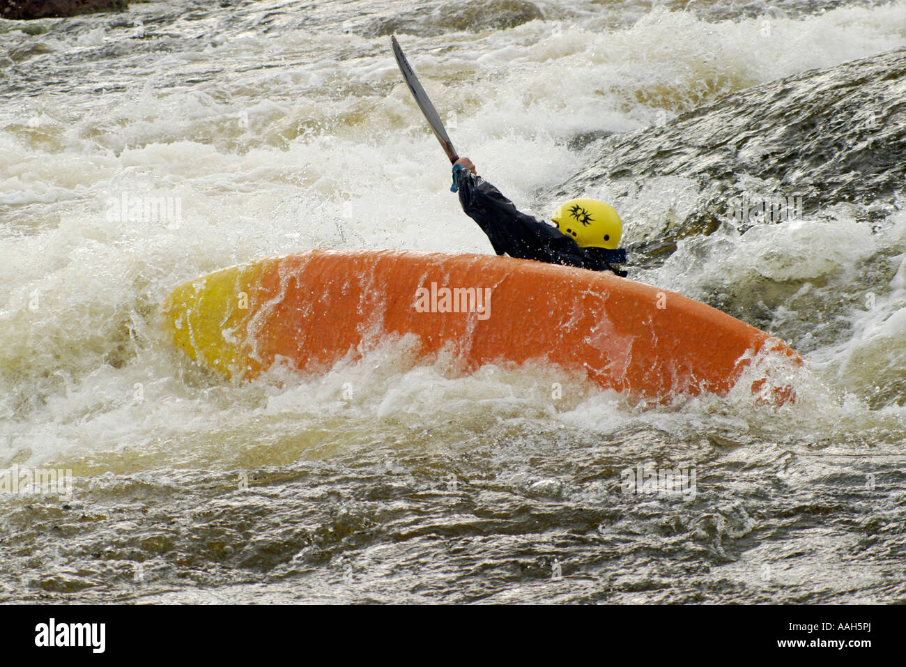 Telephoto shot of a kayaker in action Stock Photo - Alamy
