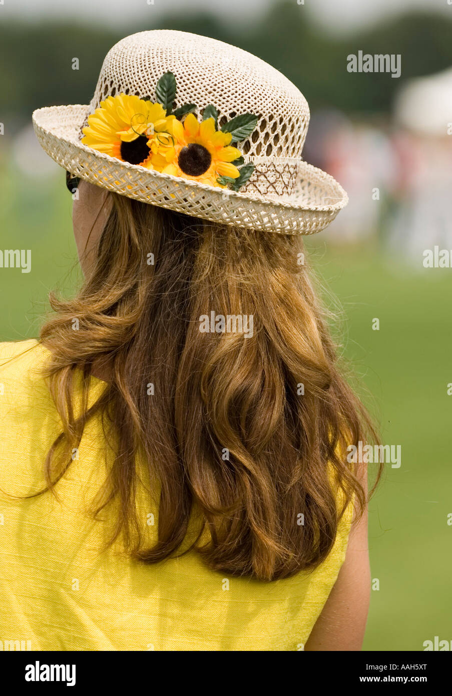 Young woman wearing pretty straw hat, back view Stock Photo - Alamy
