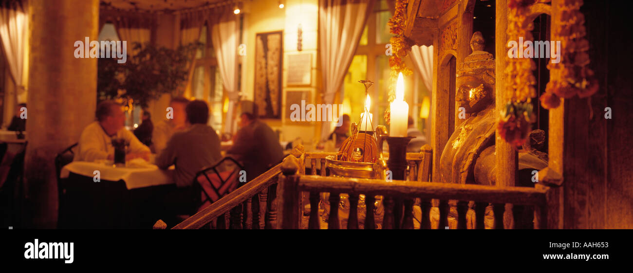 buddhist restaurant with small temple Stock Photo - Alamy