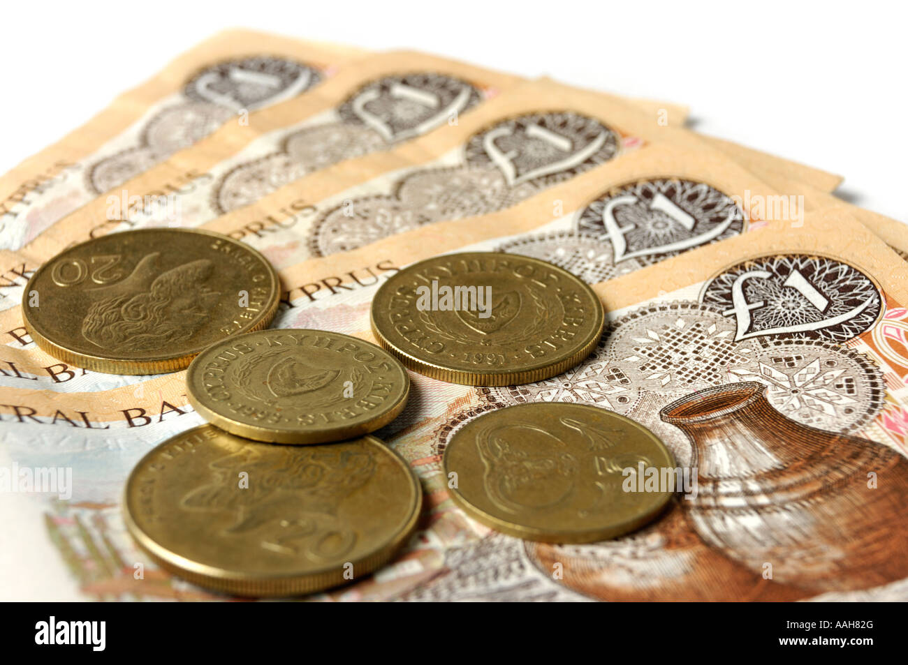 Cyprus pounds One pound bills and coins money Stock Photo - Alamy