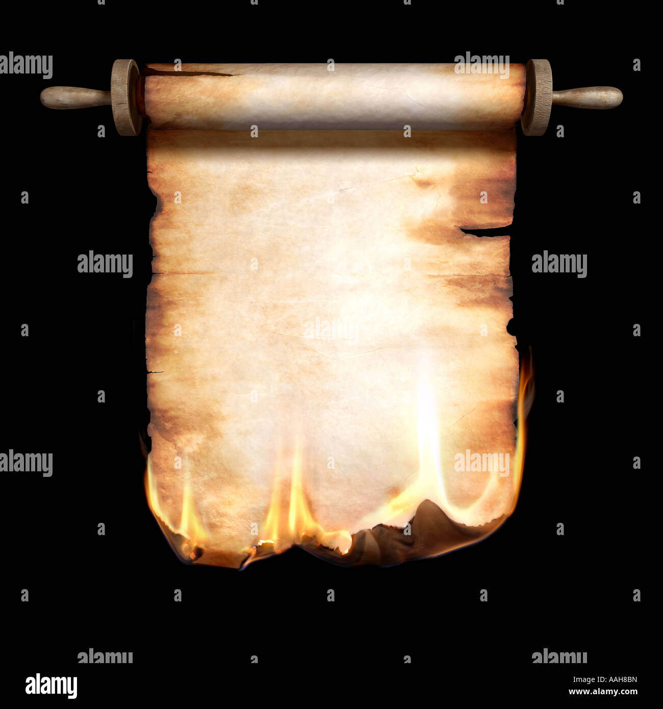 Burning roll of parchment Stock Photo - Alamy