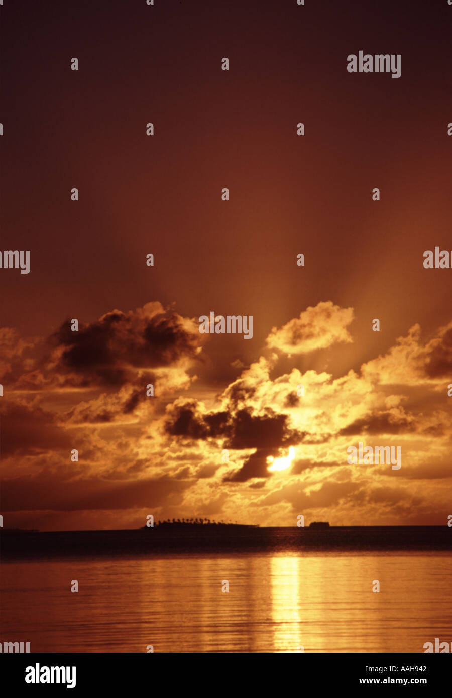 Sunset over sea and land Pangaimotu Island Nuku Alofa Tonga Stock Photo ...
