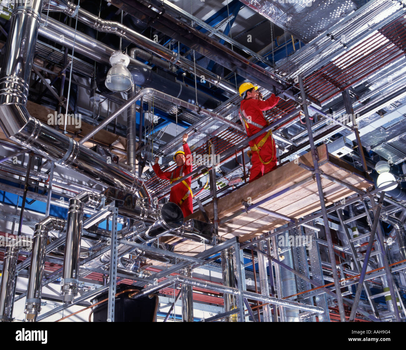 Heating Ventilation & Air Conditioning fitters Stock Photo - Alamy