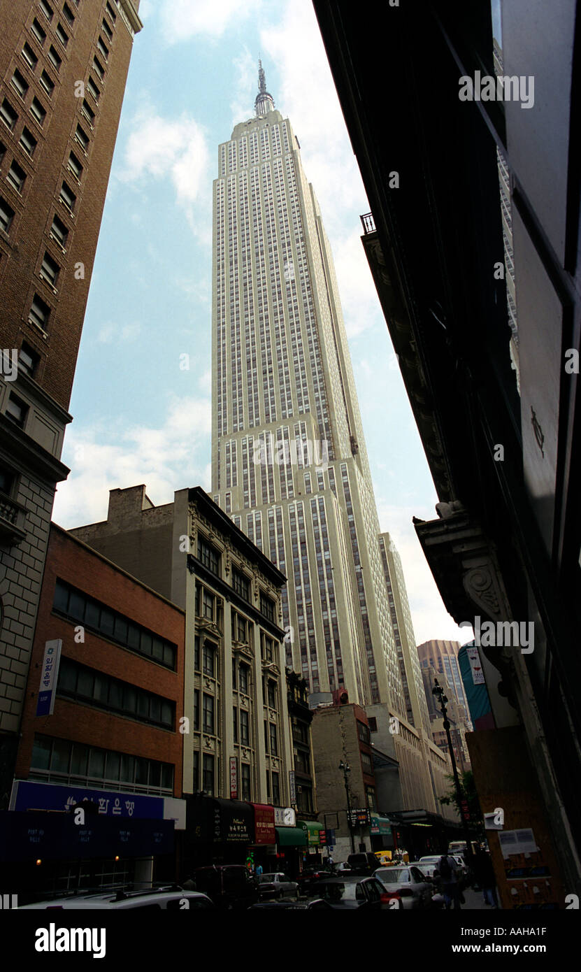 Looking up from ground level at the Empire State Building Stock Photo ...