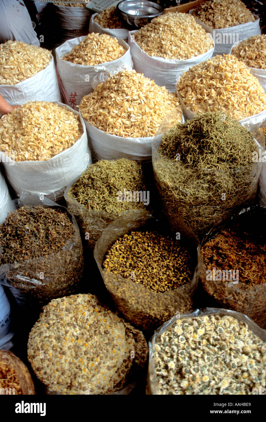 Bags of grains and dried food in a streetside market in mainland China ...