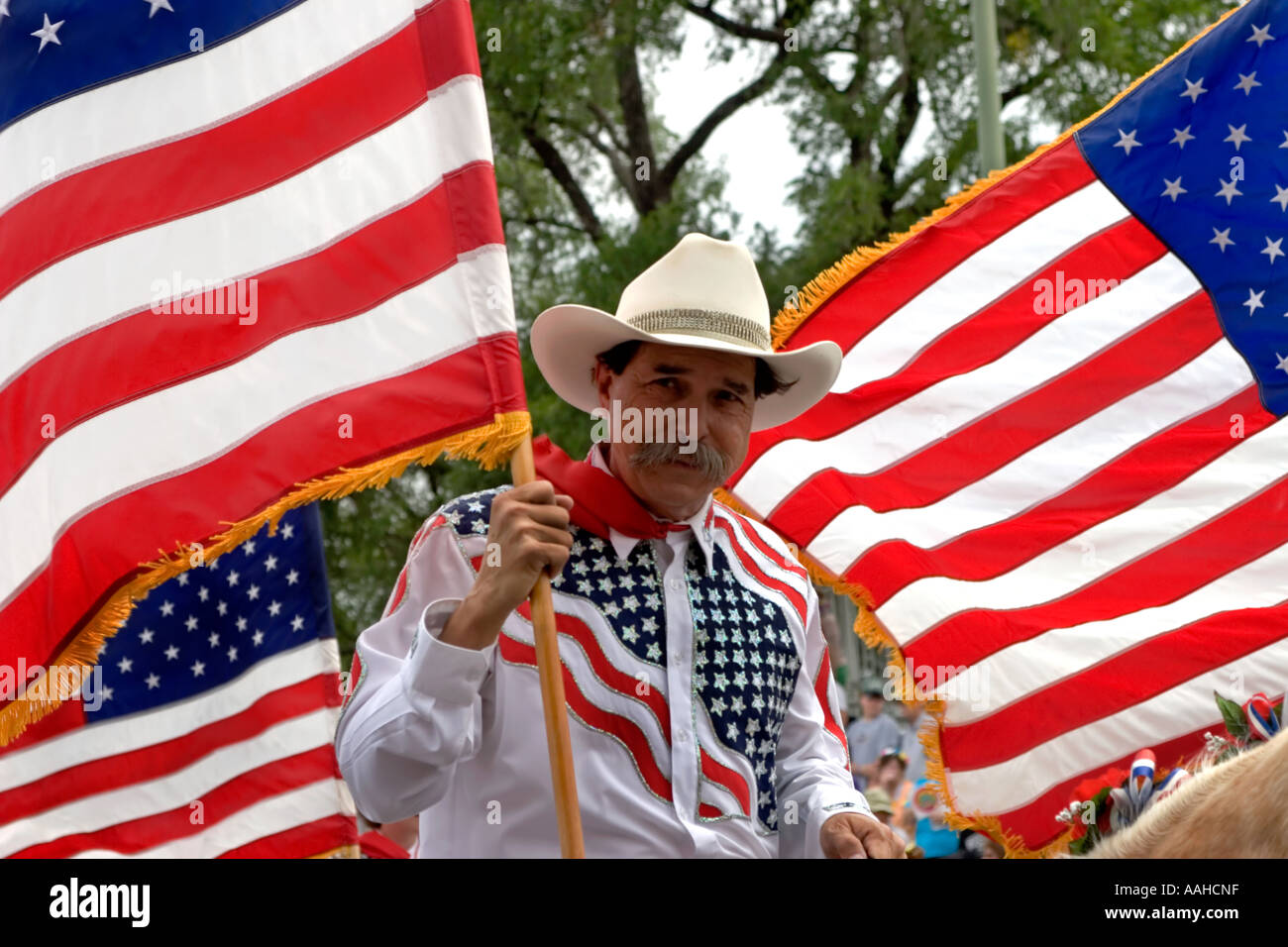 Cowboy US Flag parade Stock Photo - Alamy
