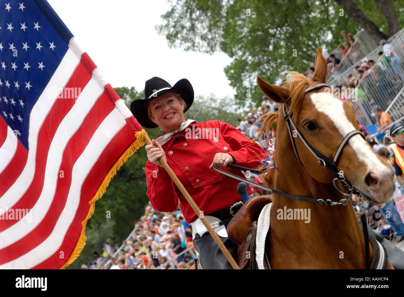 Cowgirl on horse US Flag parade Fiests parade Stock Photo - Alamy