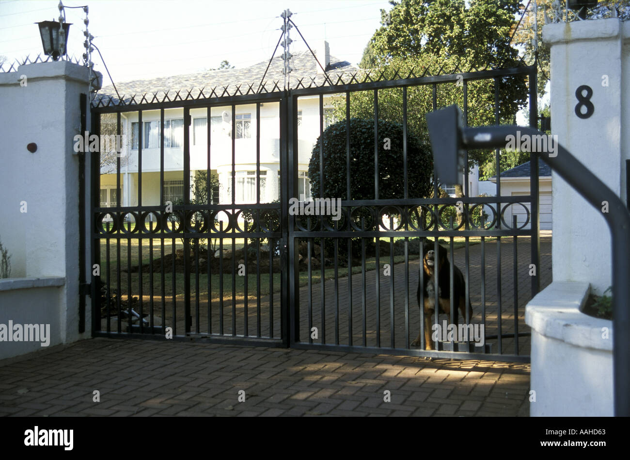 Elaborate wrought iron gates at entrance to luxury home in Rosebank a ...
