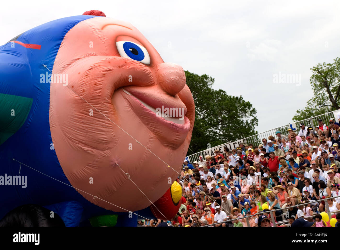 Parade floating balloon airplane flight with funny face Stock Photo - Alamy