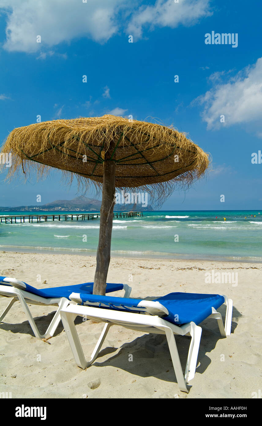 Beach chair and sunshade. Muro beach. Mallorca Island. Spain Stock ...