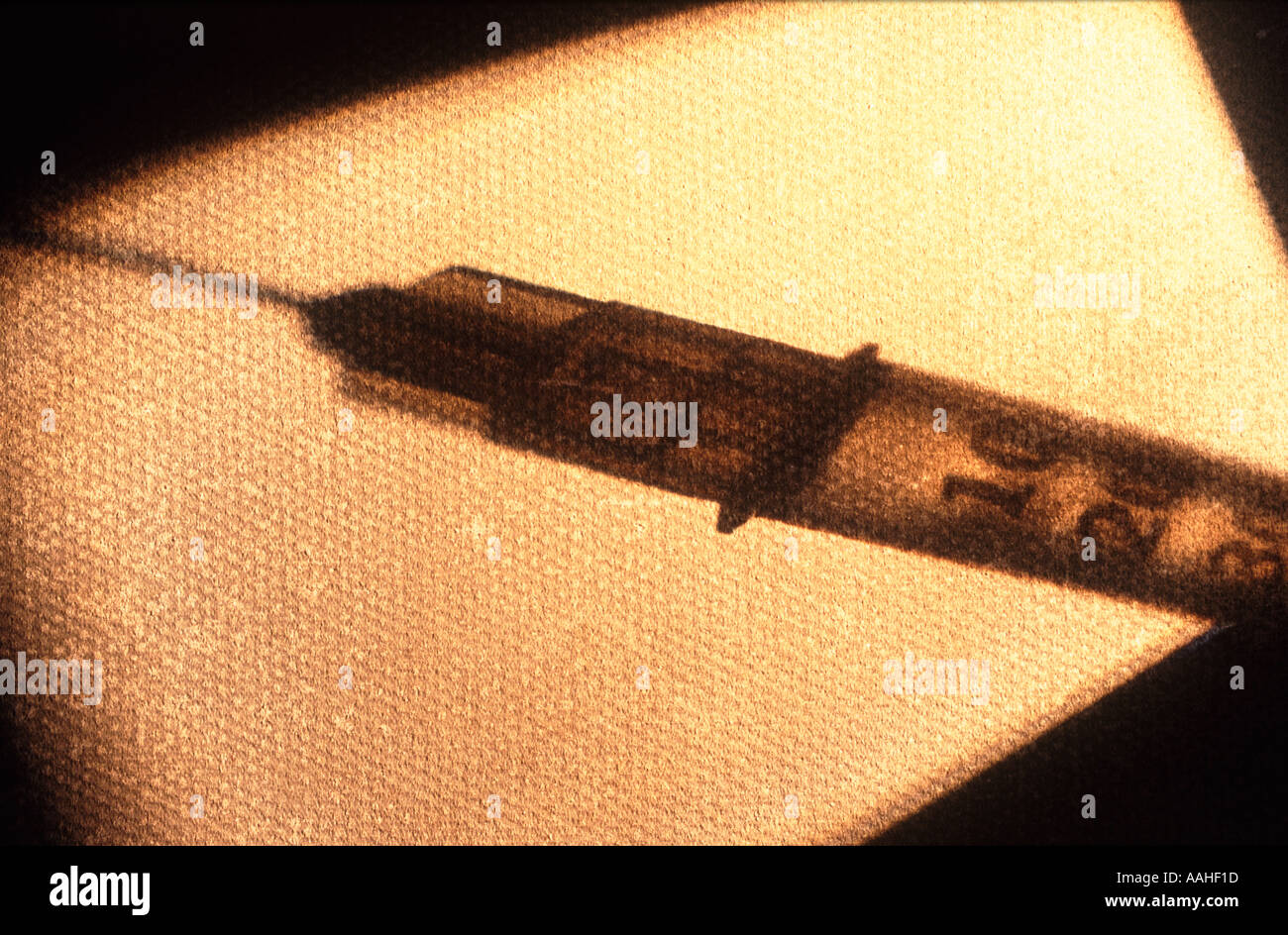 Graphic Shot of Syringe and paving Stone Stock Photo - Alamy