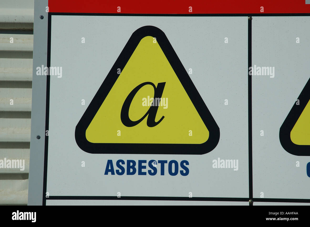 Waste hazard sign on wreckers yard dsc 1605 Stock Photo - Alamy