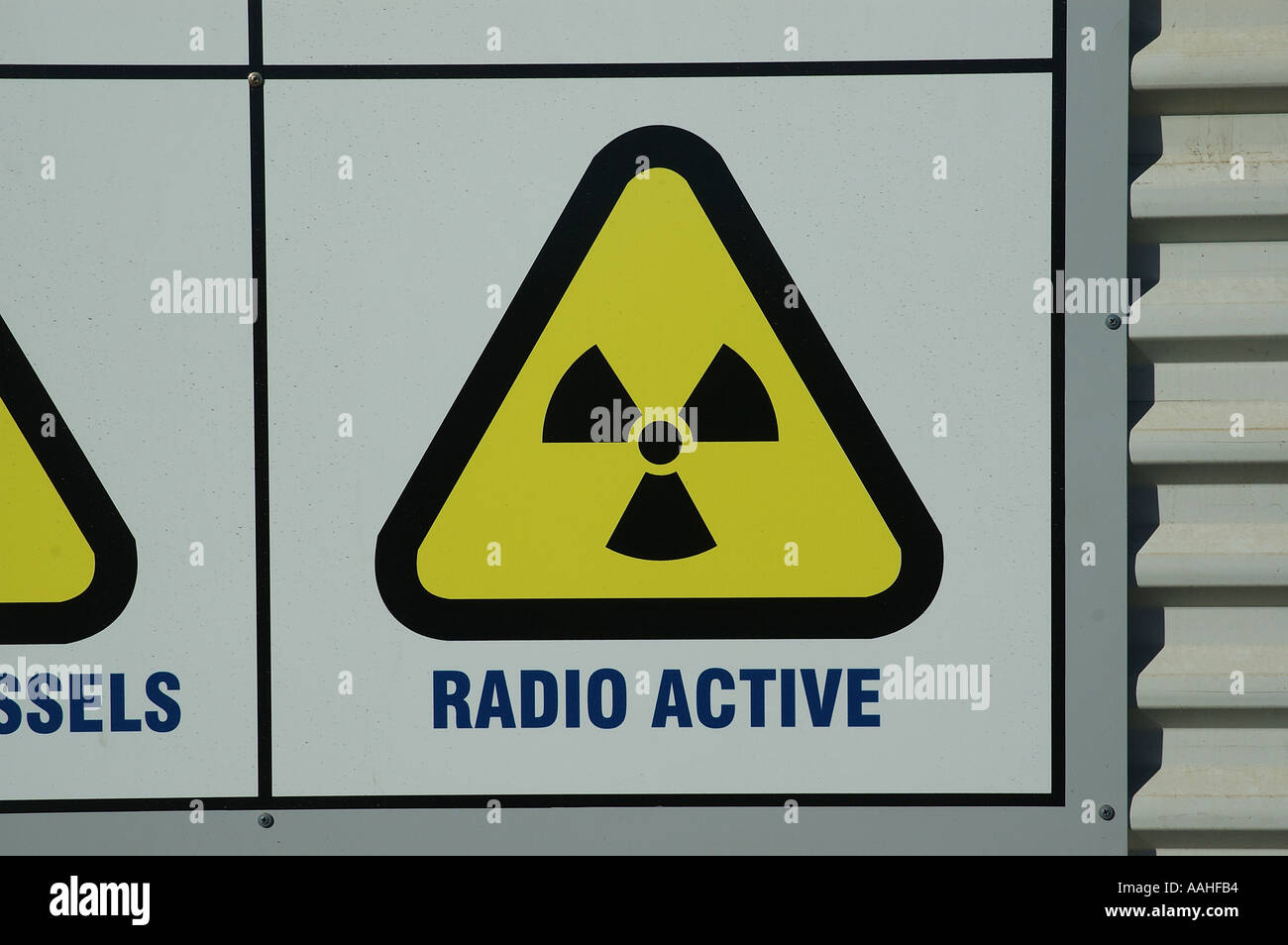 Waste hazard sign on wreckers yard dsc 1608 Stock Photo - Alamy