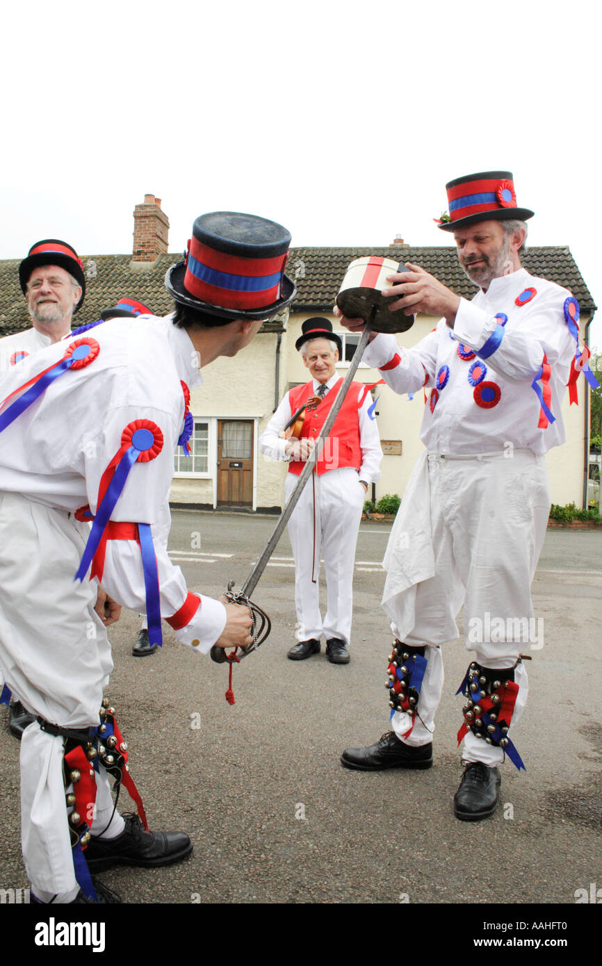 Milton Morris Dancers cutting the cake Stock Photo - Alamy