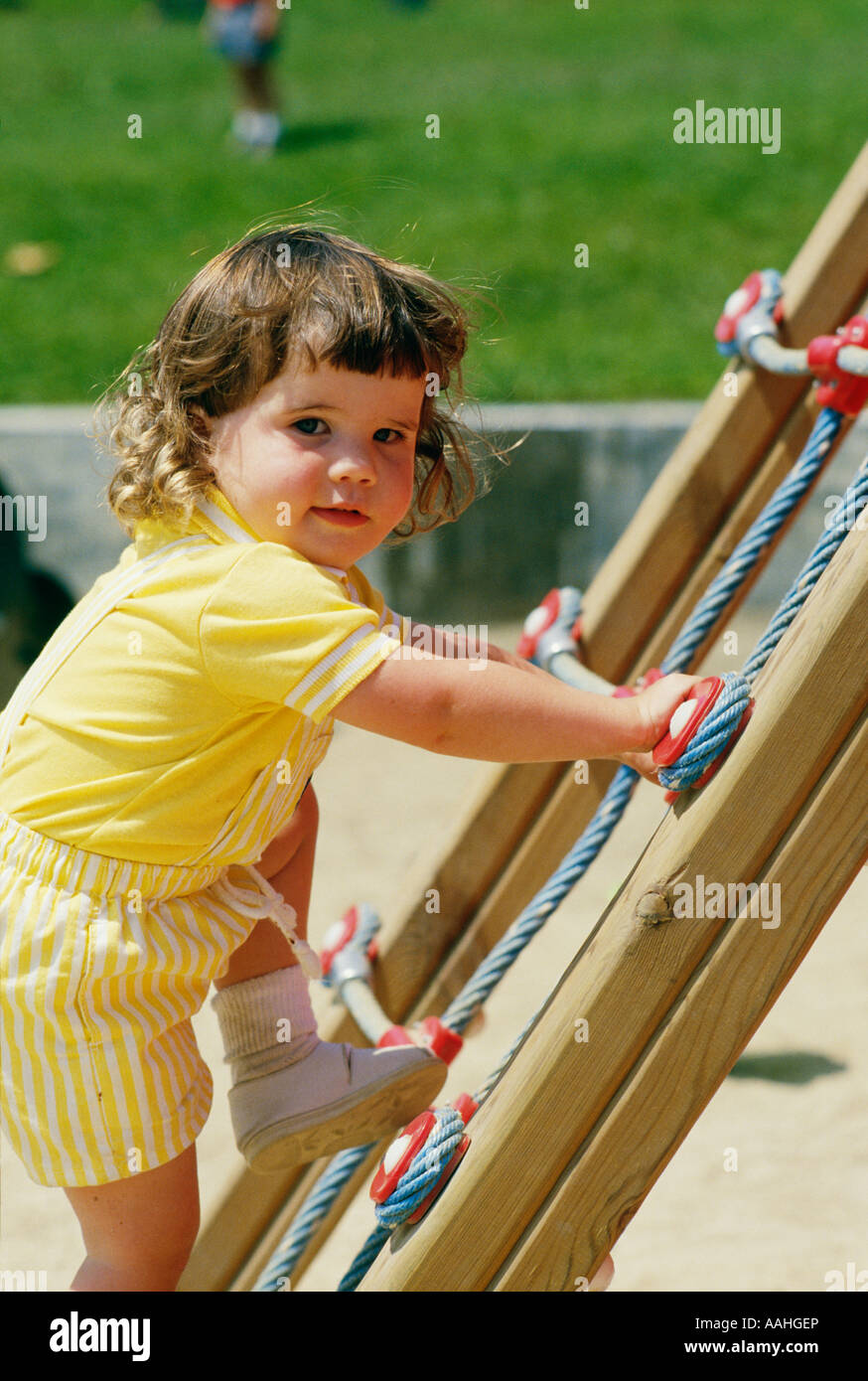 3 children climbing ladder hi-res stock photography and images - Alamy
