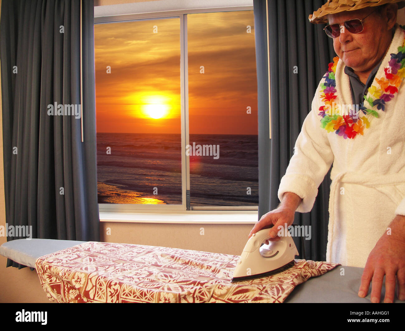 Man Pressing his shirt Stock Photo - Alamy