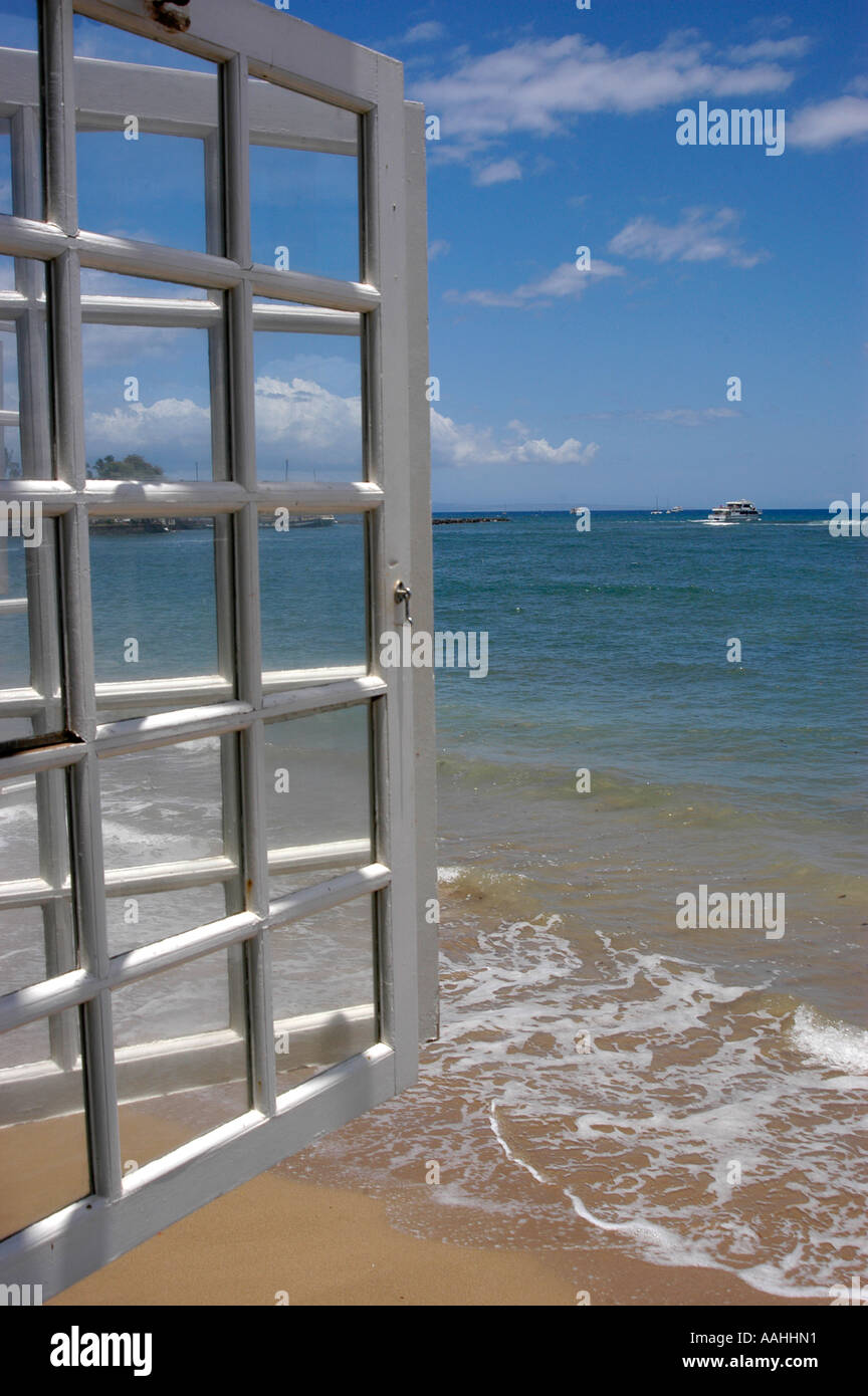 Wooden windows open to an expansive view of the sea at Lahaina Harbor ...