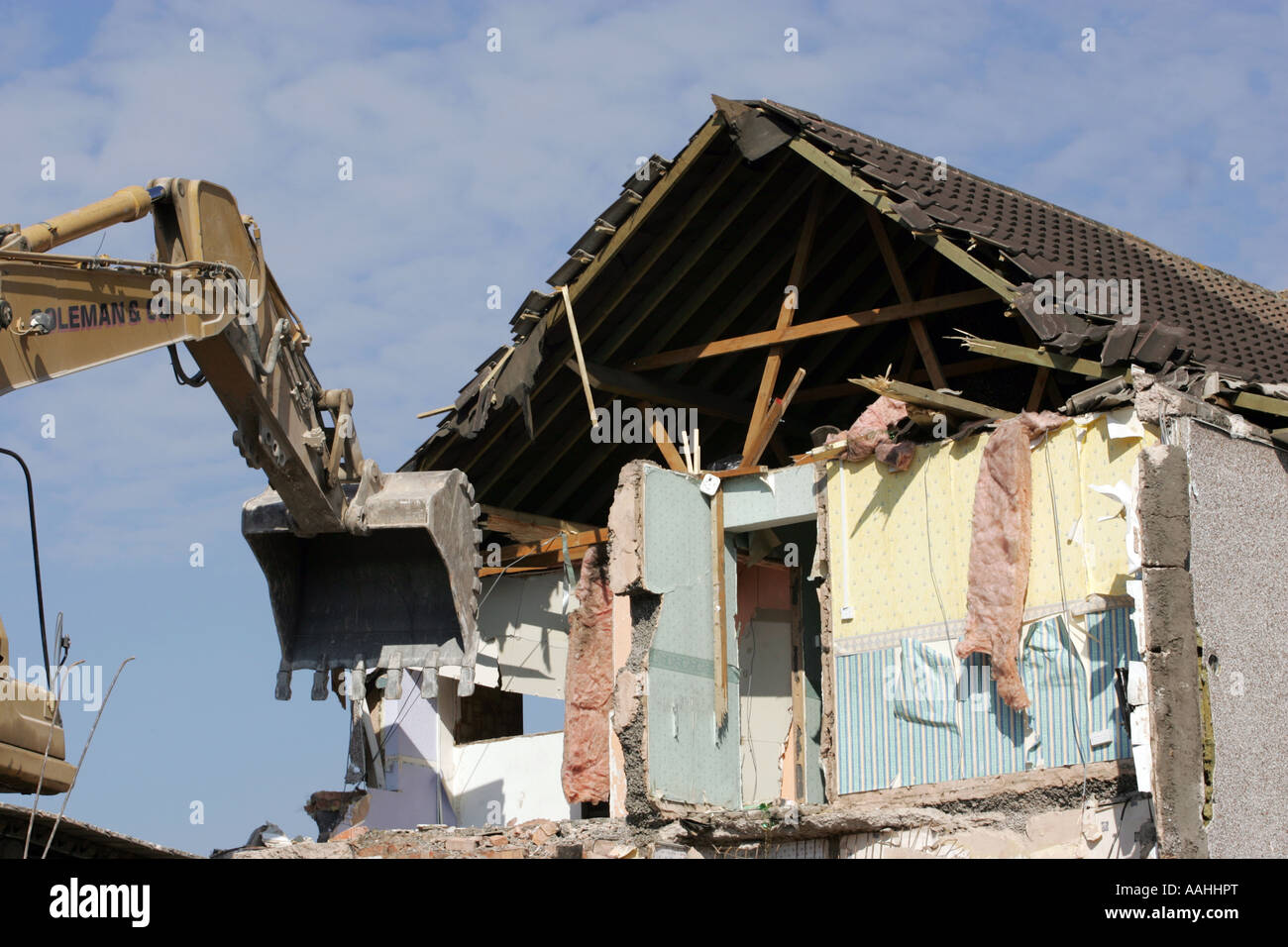 A bulldozer demolishing old council houses in Ley Hill, Northfield ...