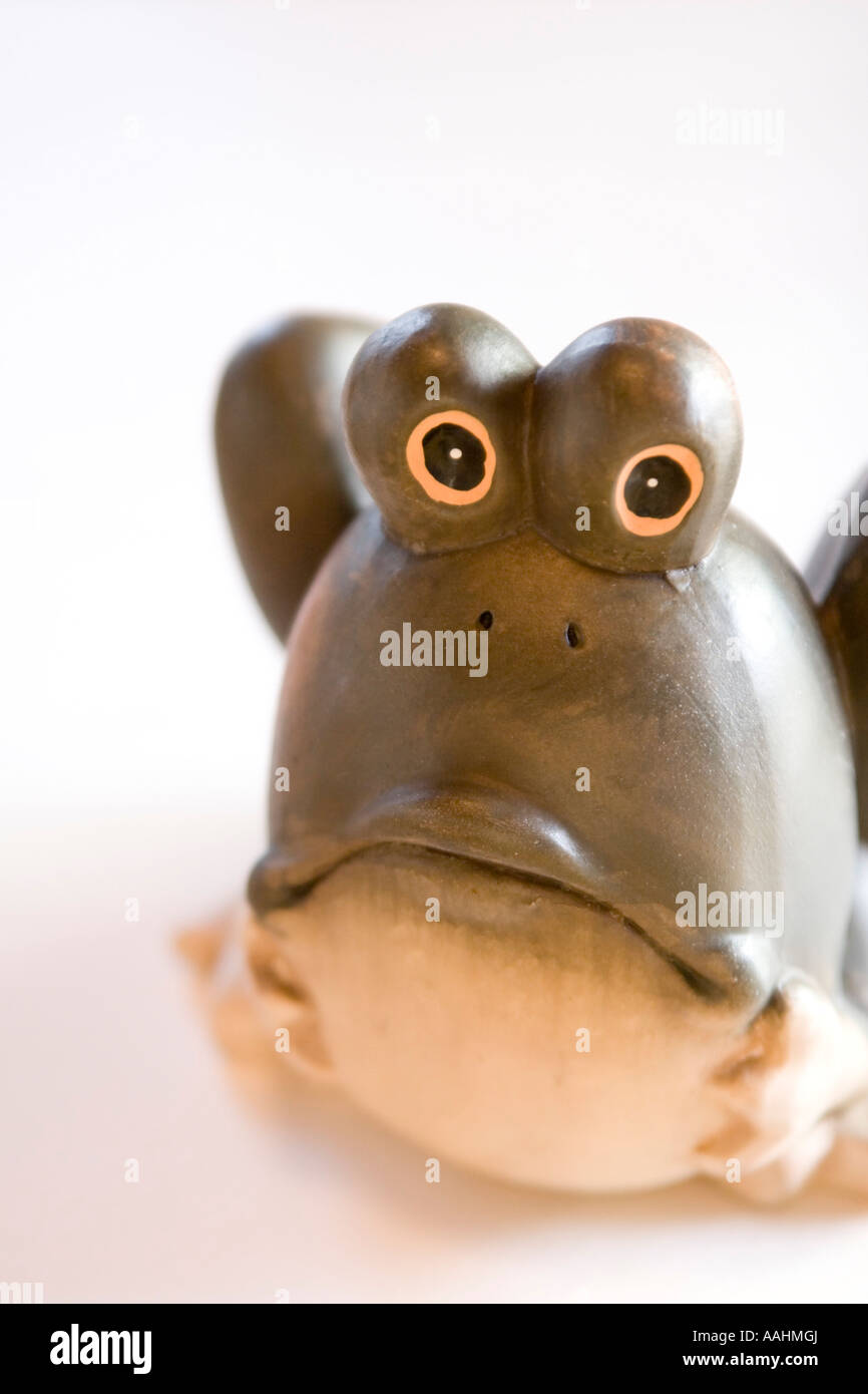 Humorous frog statue Stock Photo - Alamy