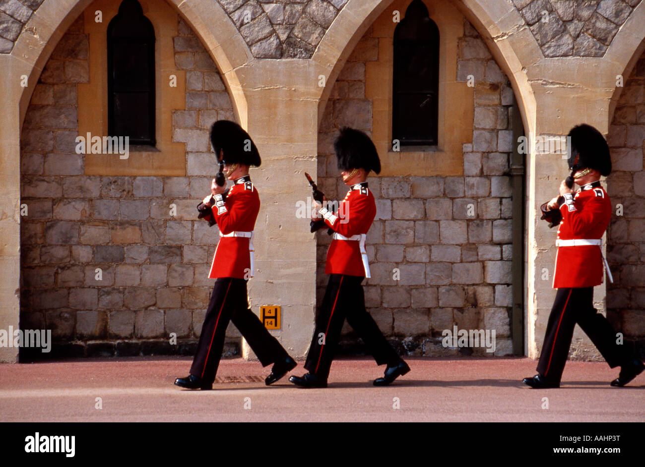 3 Guardsmen in a row - changing the guard Windsor Castle Stock Photo ...