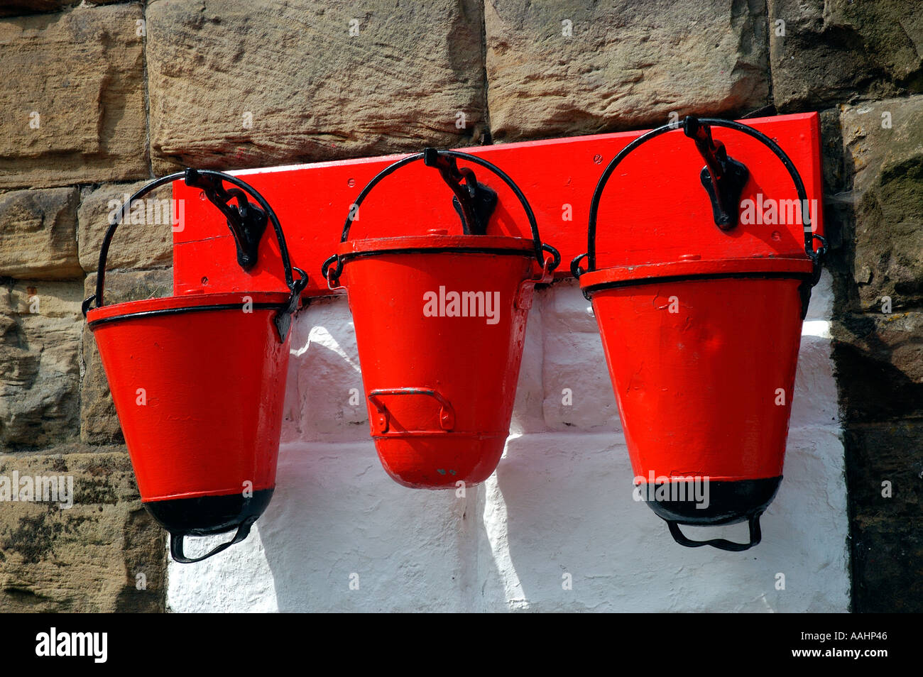 Close up of Red fire buckets at Goathland Railway Station North ...