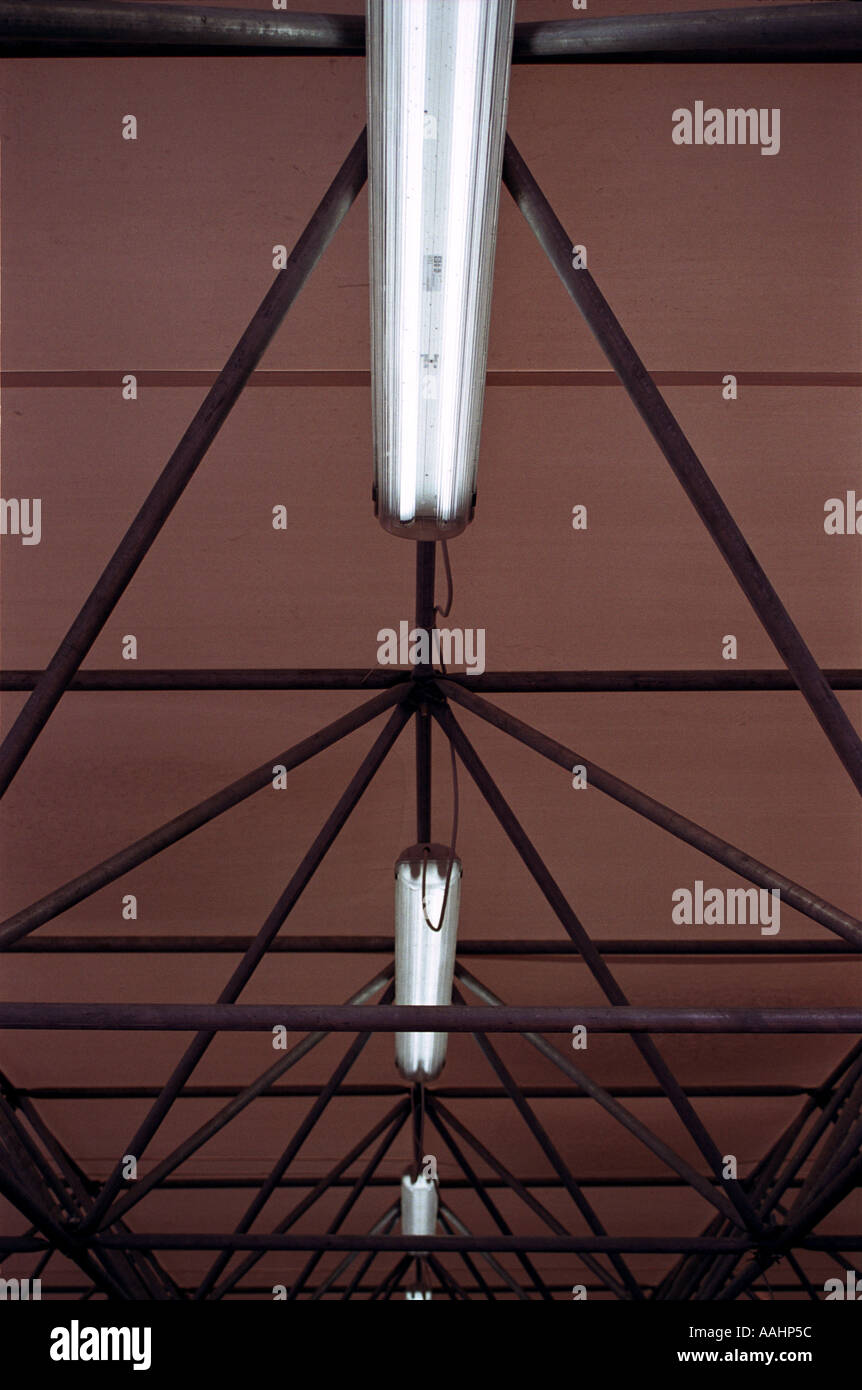 three fluorescent lighting strips with metal framework Stock Photo - Alamy