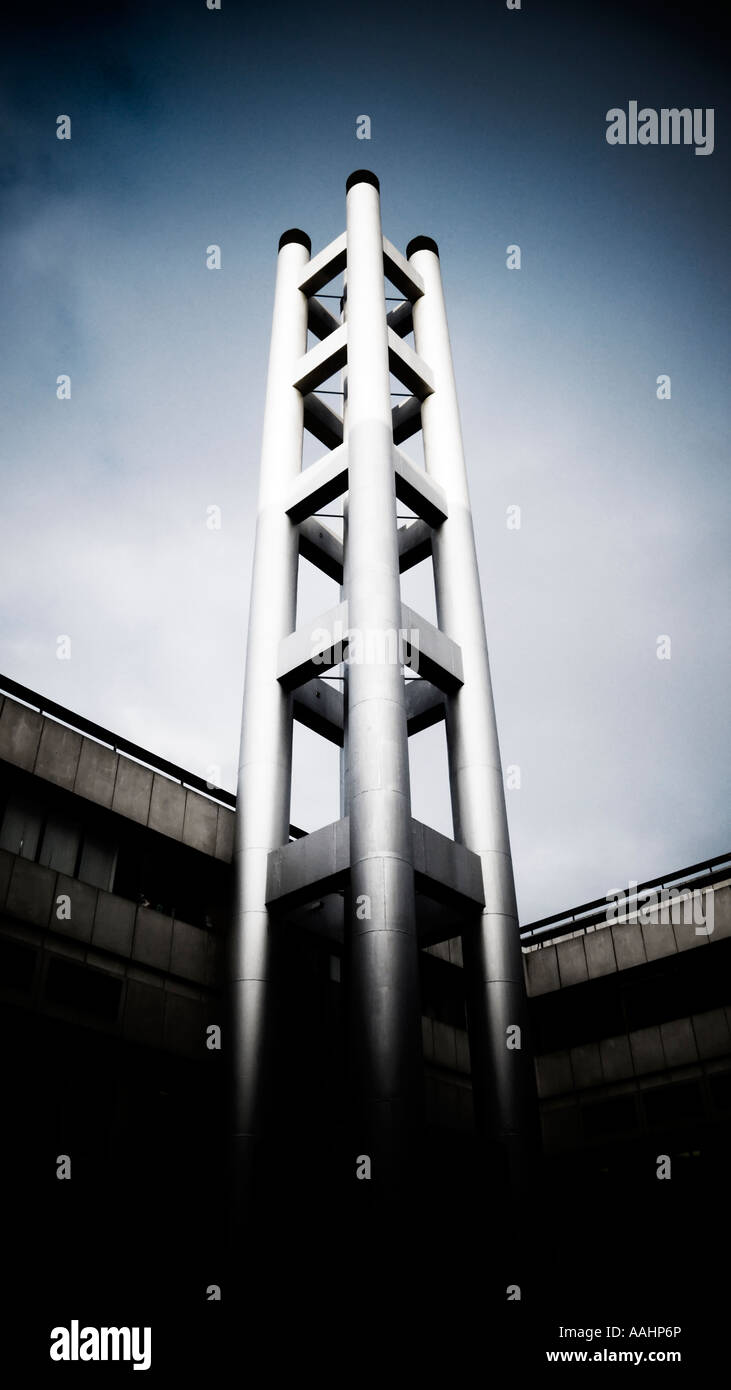 A futuristic silver chimney tower Stock Photo - Alamy