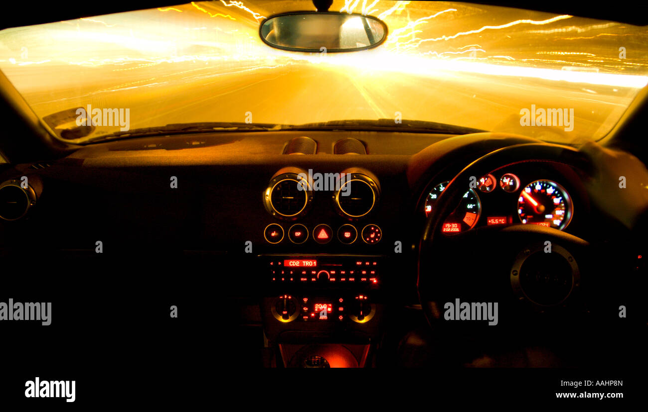 Driving fast in a sports car Stock Photo - Alamy