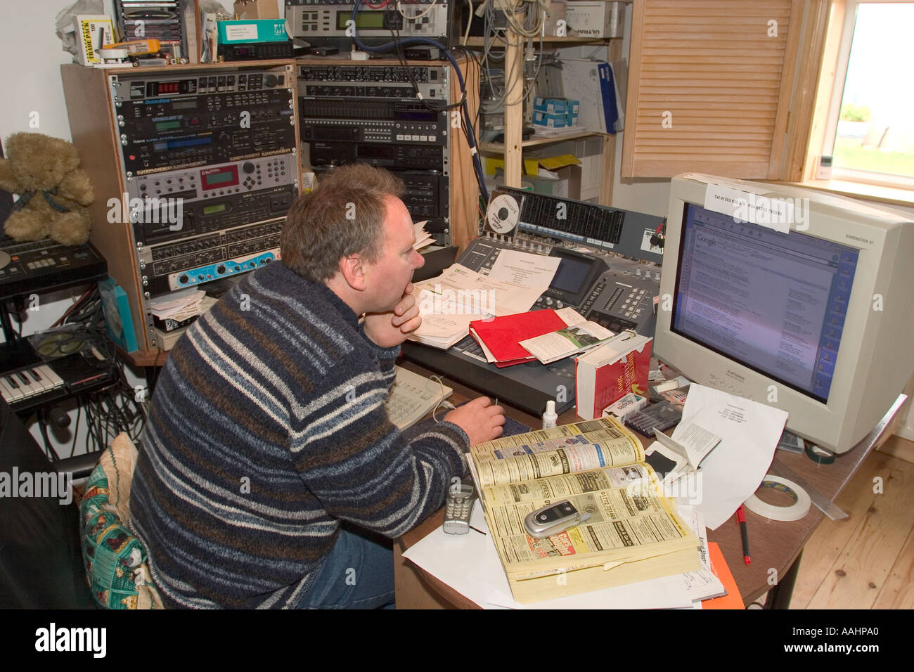 recording engineer working in home studio Stock Photo - Alamy