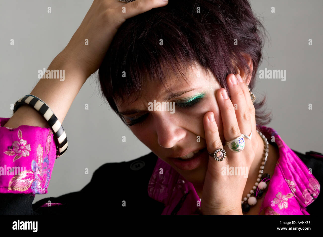 horizontal sad young woman expressing anxiety Stock Photo - Alamy
