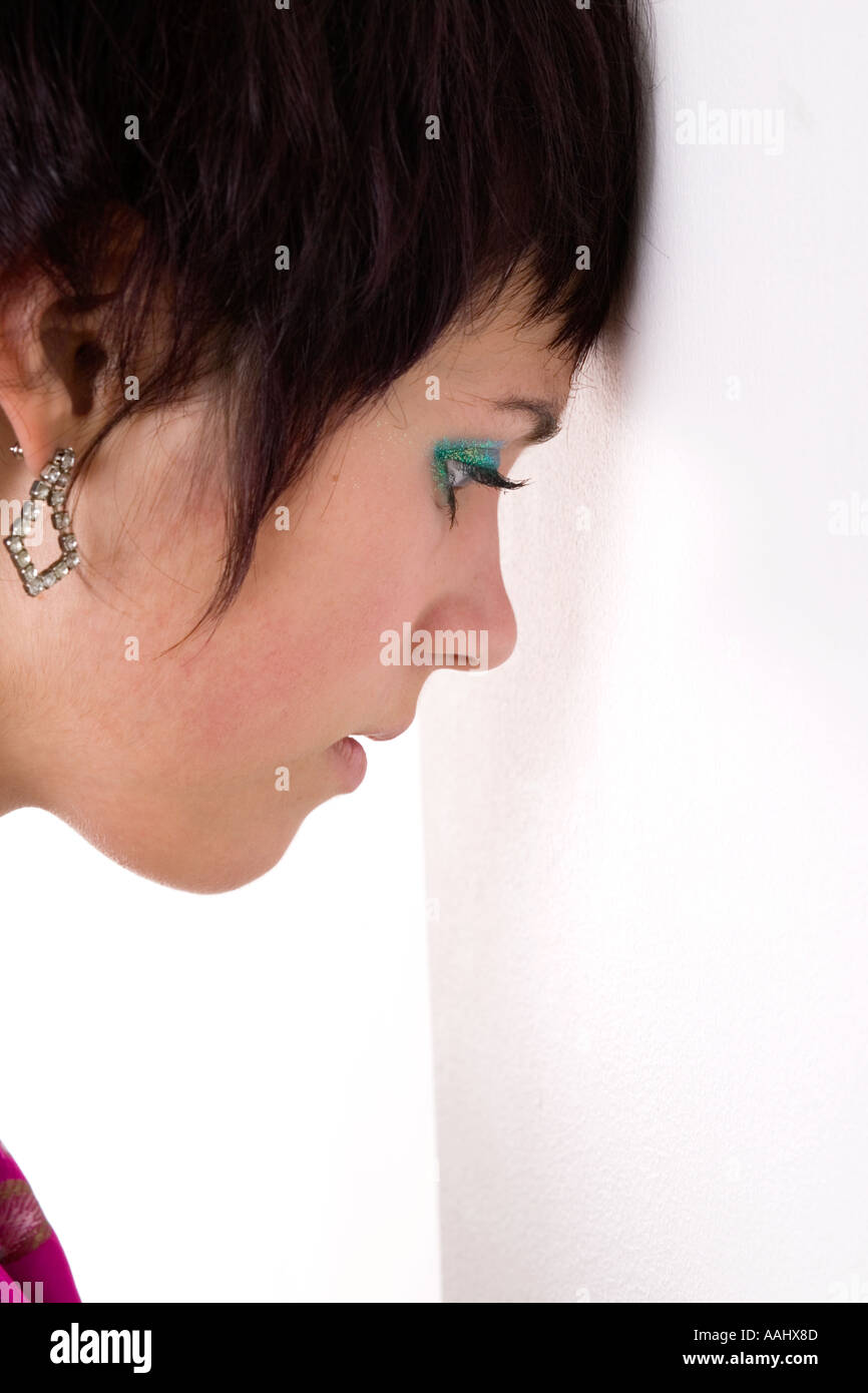 vertical sad young woman expressing anxiety Stock Photo - Alamy