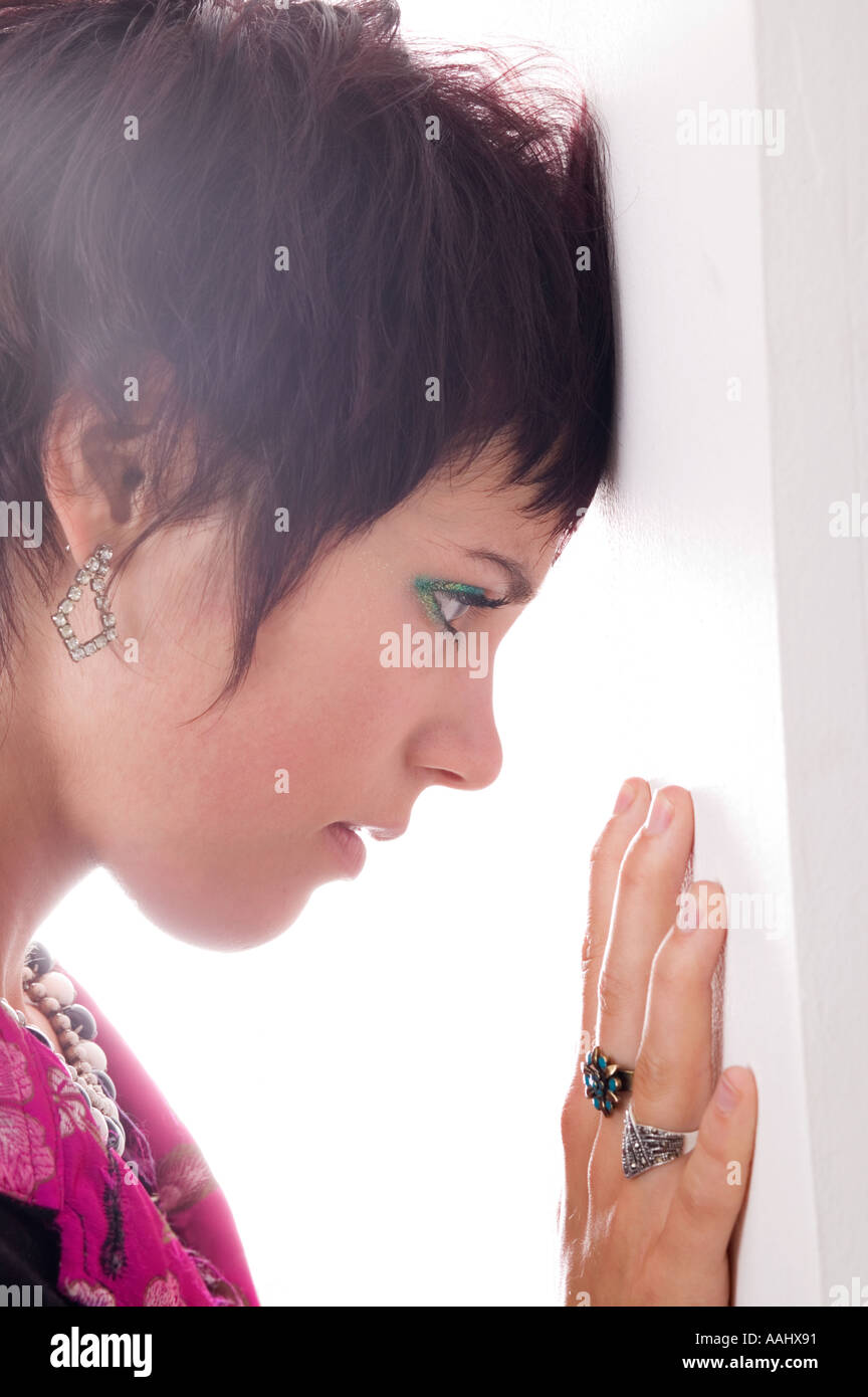 vertical sad young woman expressing anxiety Stock Photo - Alamy