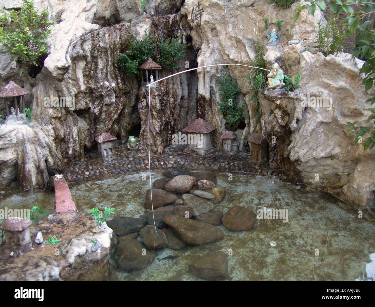 A water feature in the front of a Chinese immigrants house Stock Photo ...