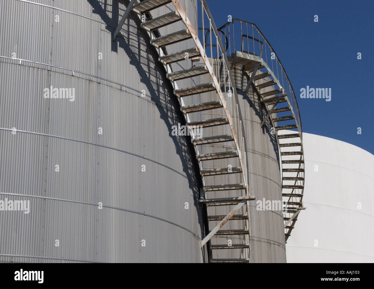 oil storage tanks from a low camera angle Stock Photo - Alamy