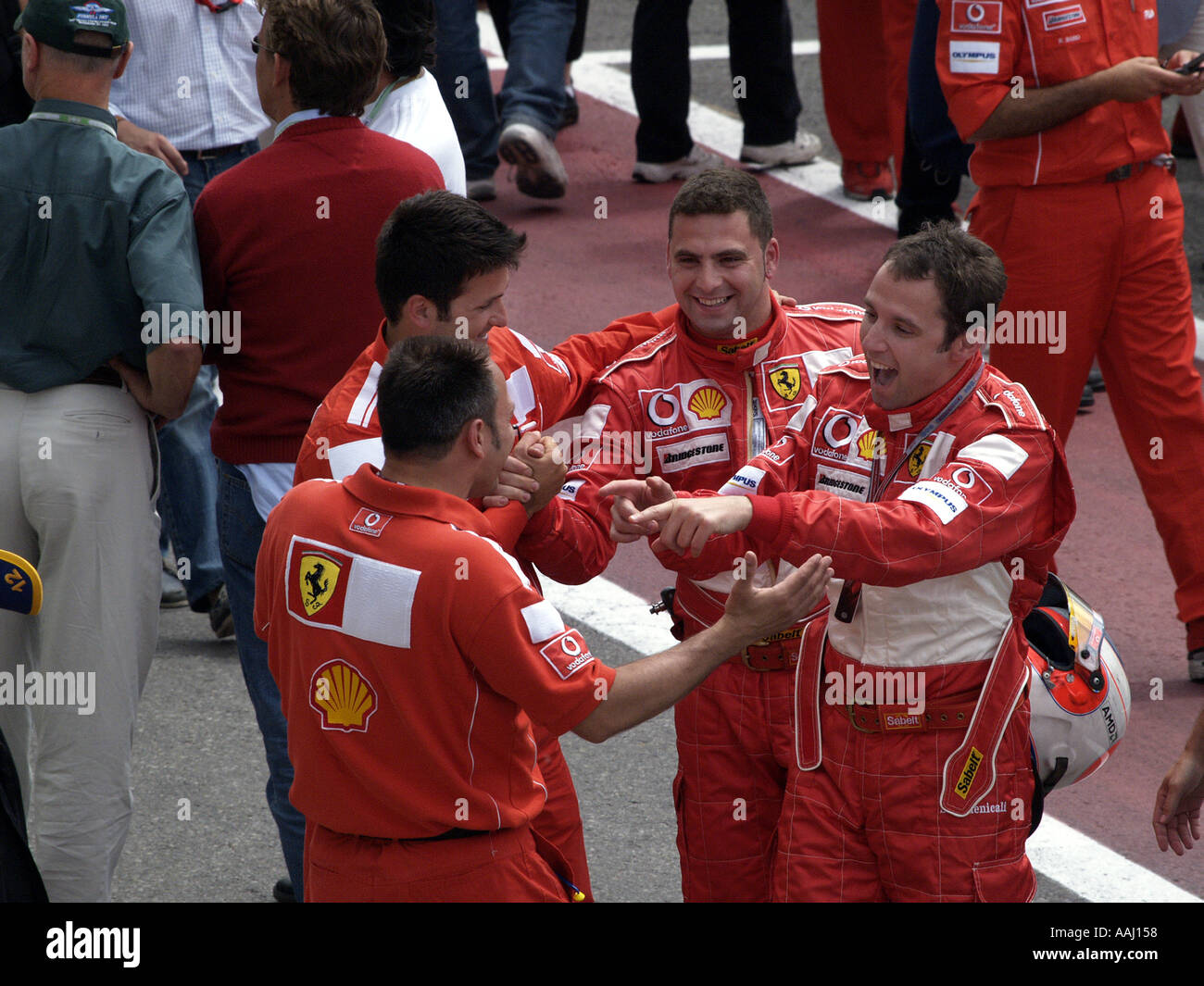 Ferrari team celebrating Stock Photo - Alamy