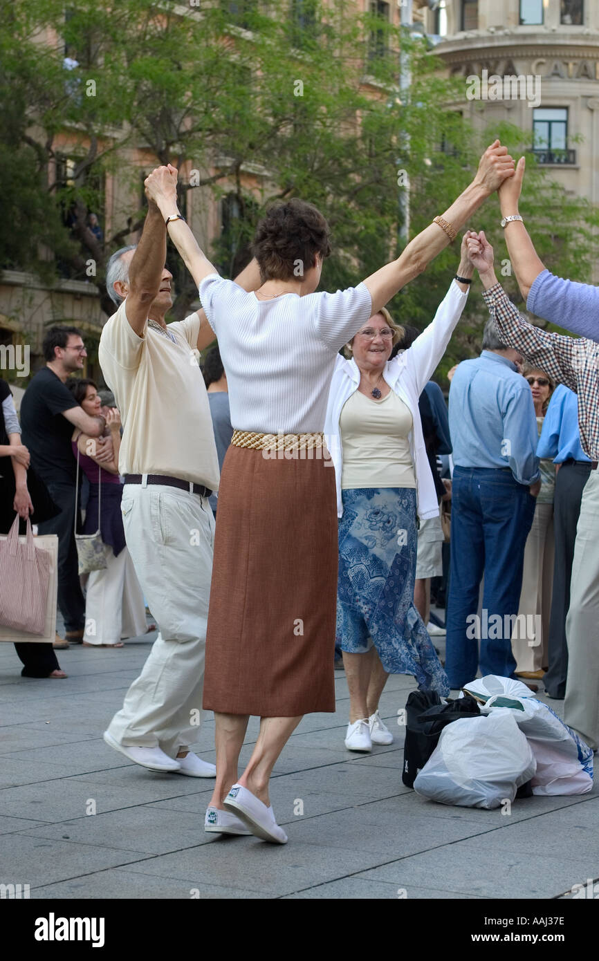 People dancing sardana traditional dance hi-res stock photography and ...