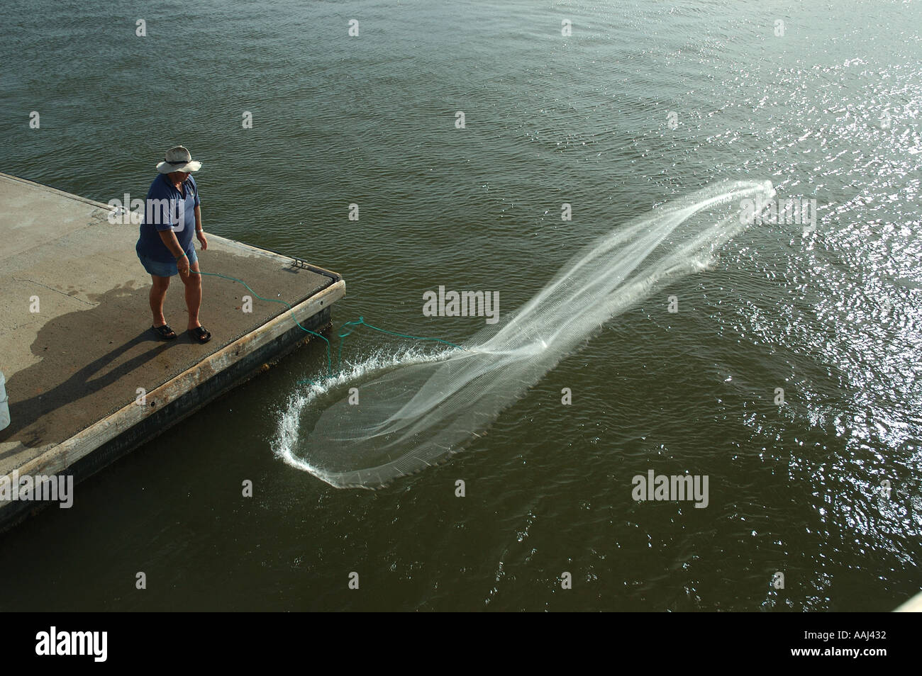 Fisherman casts net catch fish hi-res stock photography and images - Alamy