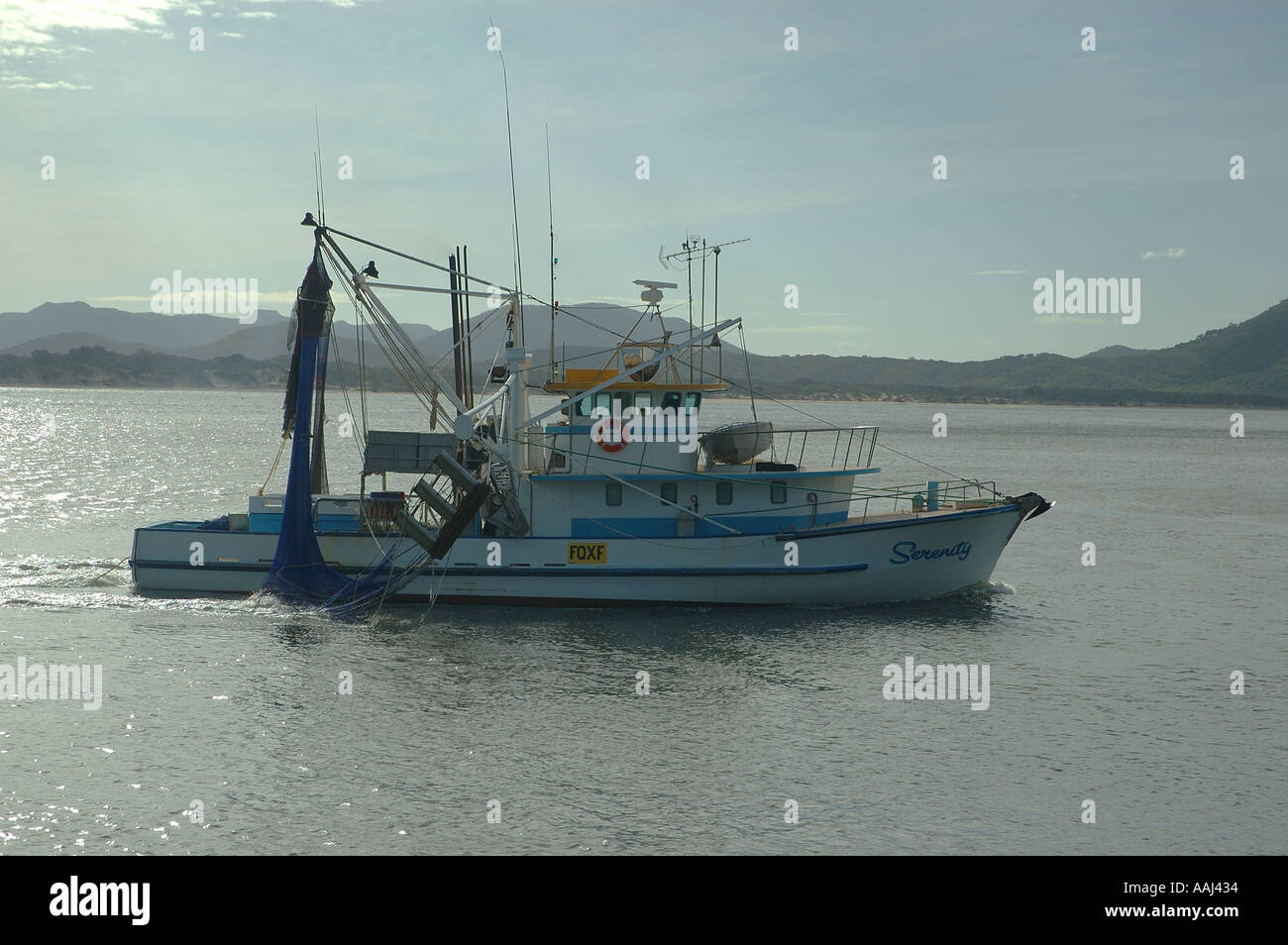 Large northern fishing trawler leaving Cooktown harbour midday north ...