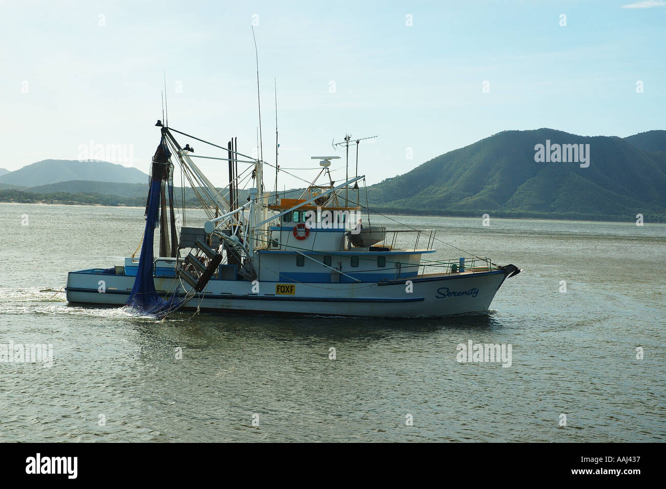 Large northern fishing trawler leaving Cooktown harbour midday north ...