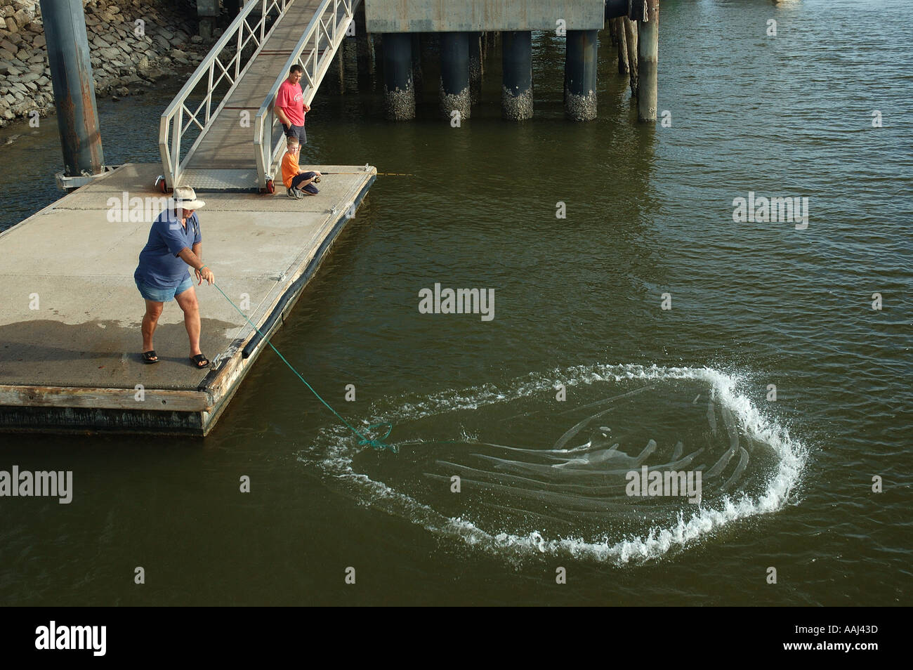 Fisherman casts net catch fish hi-res stock photography and images - Alamy