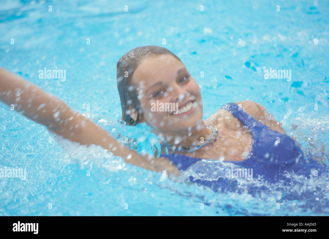 Woman swimming back stroke hi-res stock photography and images - Alamy