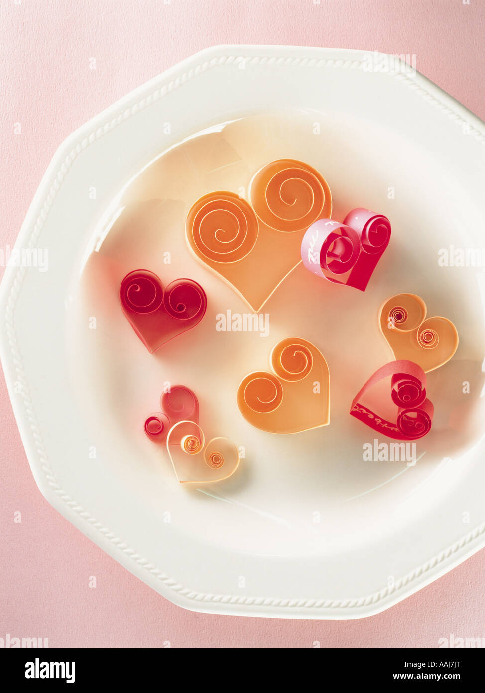 Heart shape color paper Stock Photo - Alamy