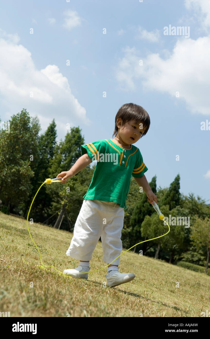 Asian children jump rope hi-res stock photography and images - Alamy