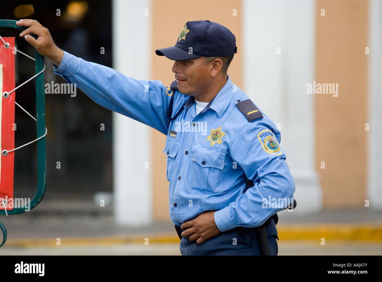 police officer with a hand stretch and a hat in the head Stock Photo ...