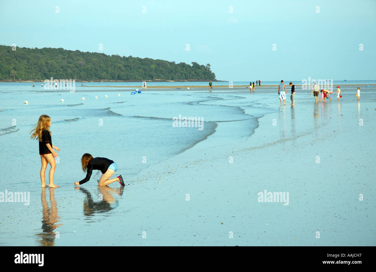 Children collecting shells, Langkawi Island, Malaysia Stock Photo - Alamy