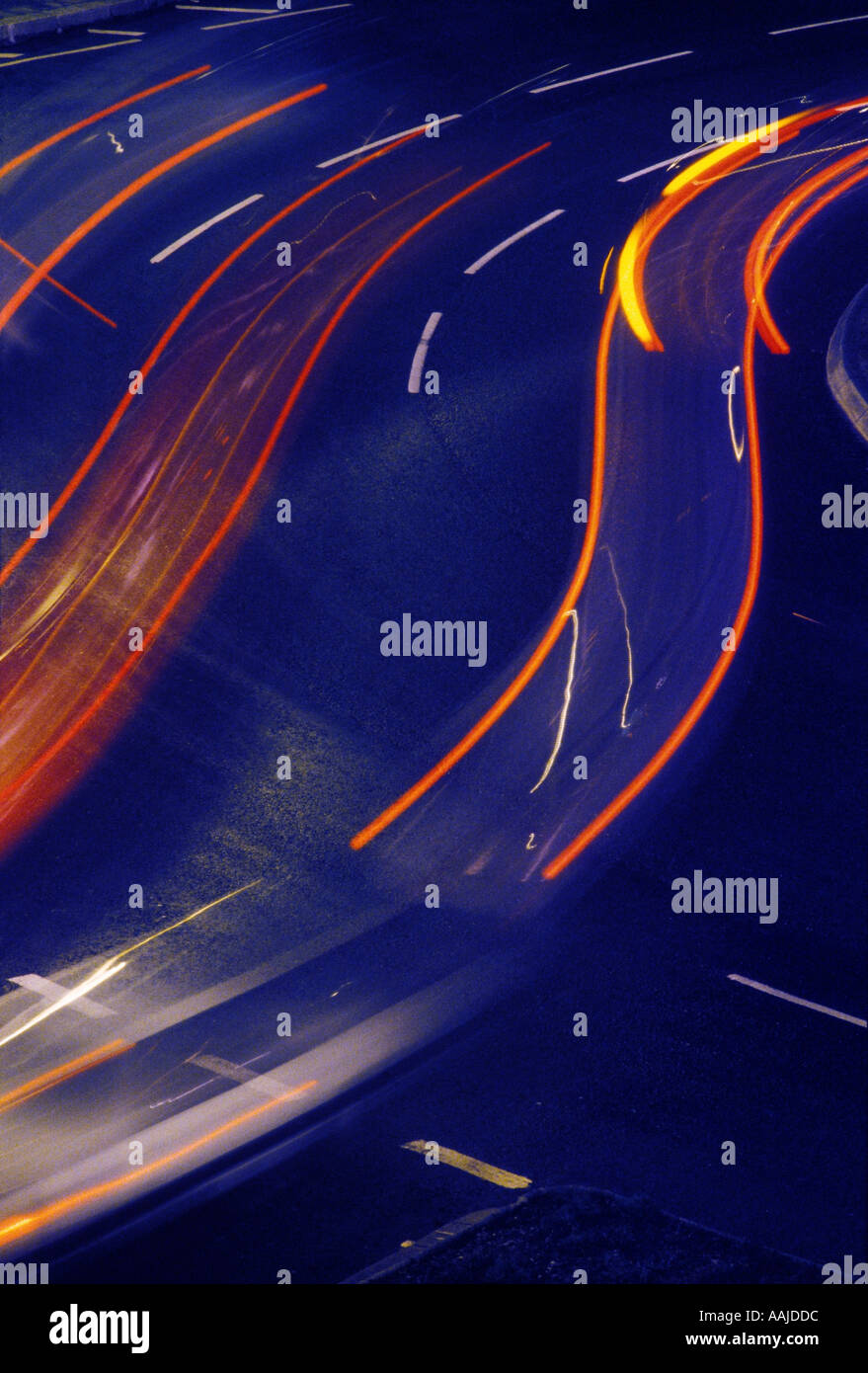 Road at night with car light trails UK Stock Photo - Alamy