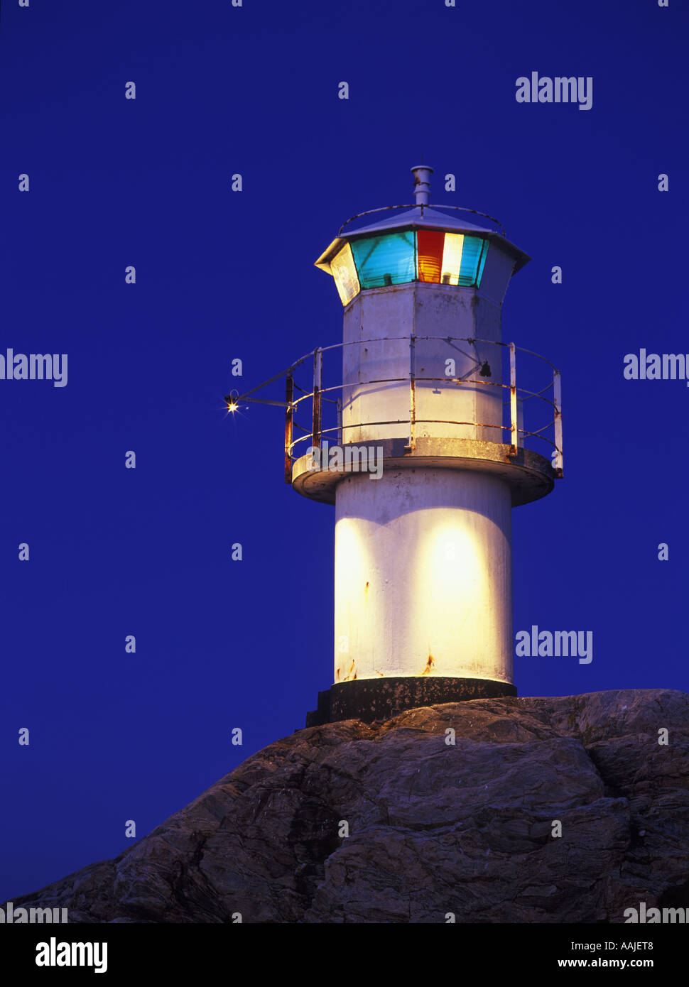 Light house on rock Stock Photo - Alamy