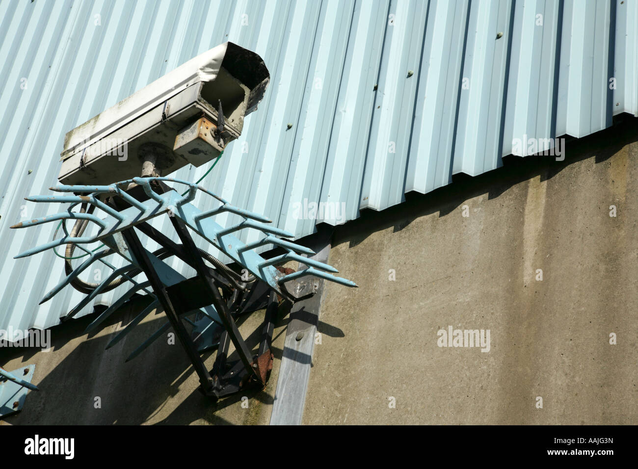 Damaged CCTV cameras on the perimeter wall of the disused Crumlin Road ...