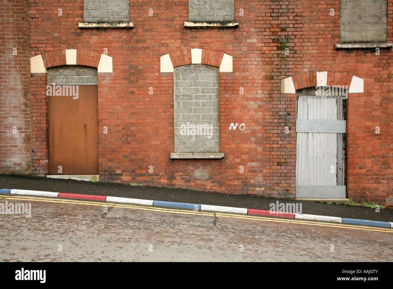 Boarded up housing in Wapping Lane in The Fountain estate, Londonderry ...