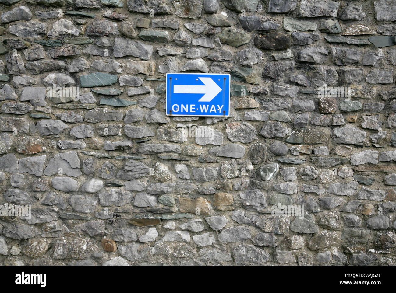 One Way sign mounted on stone wall in the Yorkshire Dales, Great ...